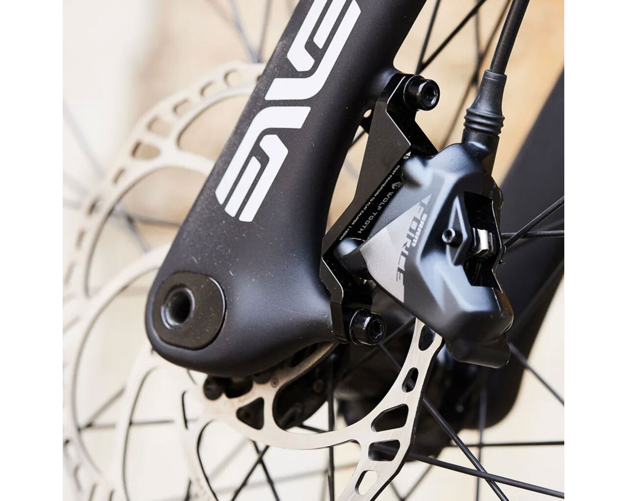 Wolf Tooth Post to Flat Mount Brake Adaptor | Merlin Cycles